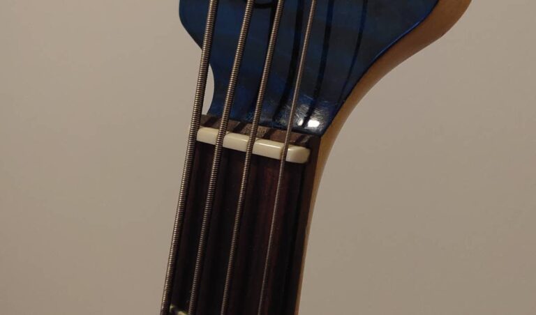 The Complete Guide To Bass Guitar Nut Height - BassOx