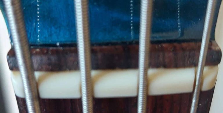Bass Guitar Rattle (why it happens and how to fix it) - BassOx